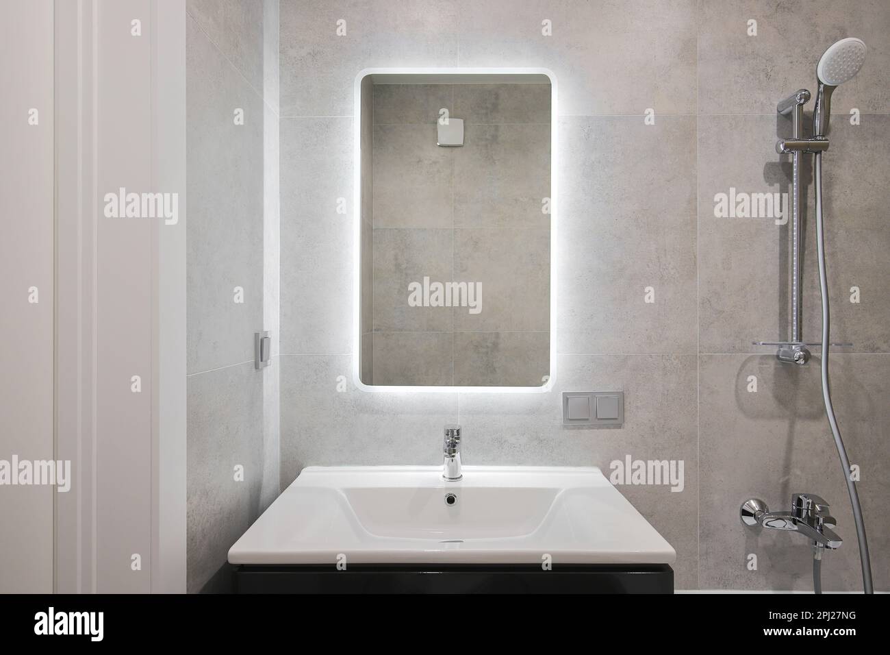 Faucet with white ceramic sink and mirror in the bathroom Stock Photo ...