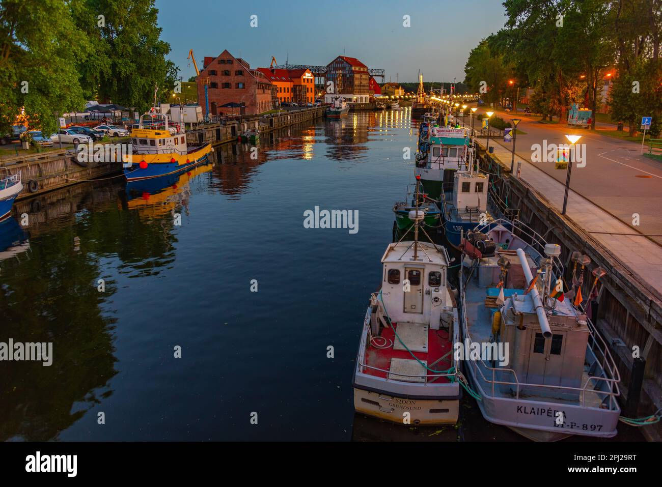 Klaipeda, Lithuania, July 3, 2022: Boats mooring at riverside of Danes ...