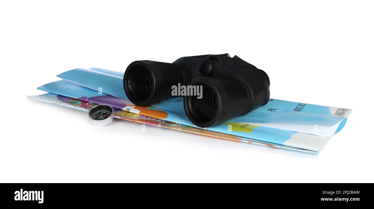 Modern binoculars, compass and map on white background Stock Photo - Alamy
