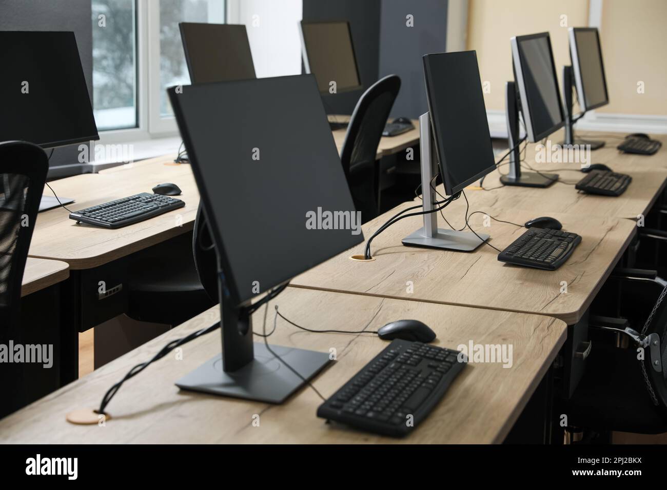 Rows of computers in empty office hi-res stock photography and images ...