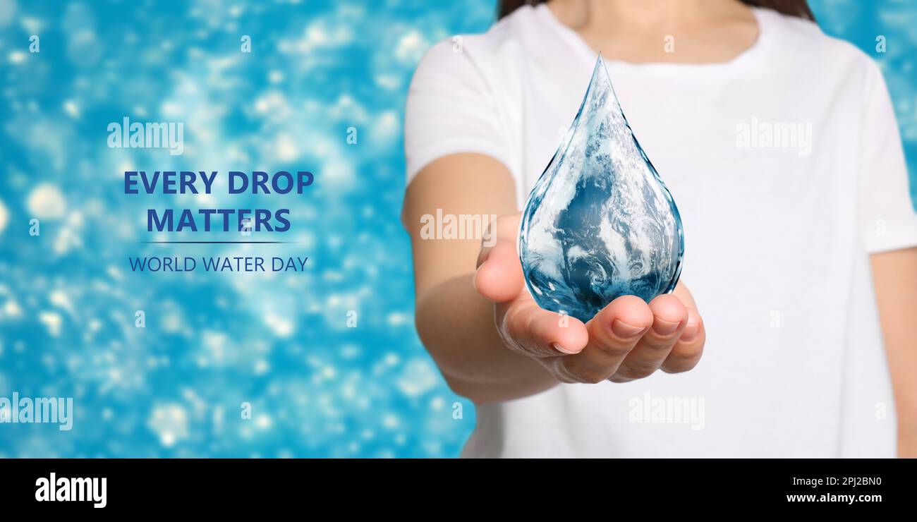 World Water Day. Woman holding icon of drop with Earth image inside on ...