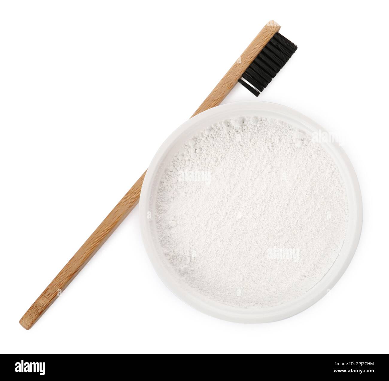 Bowl of tooth powder and brush on white background, top view Stock ...