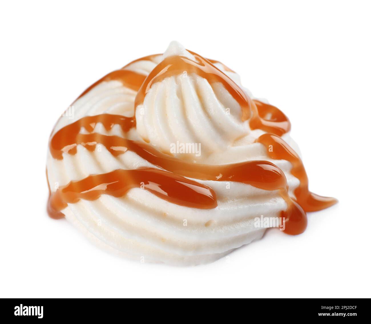 Delicious fresh whipped cream with caramel sauce isolated on white ...
