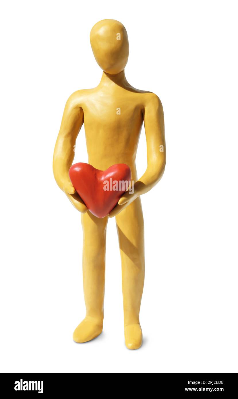 Yellow plasticine human figure with pink heart isolated on white Stock Photo - Alamy