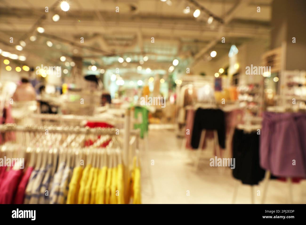 Blurred view of store interior in shopping mall. Bokeh effect Stock ...