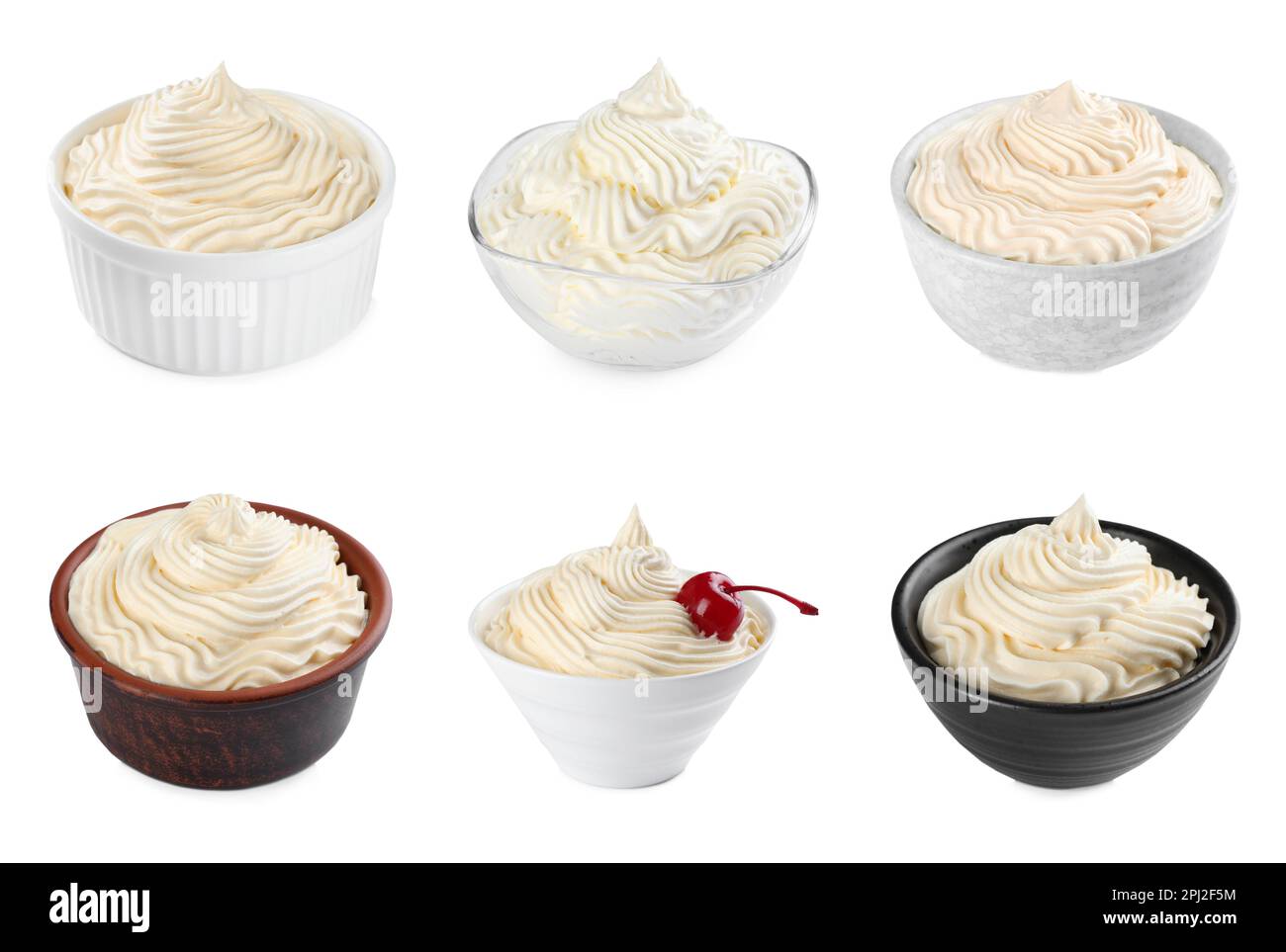 Set with delicious fresh whipped cream on white background Stock Photo ...