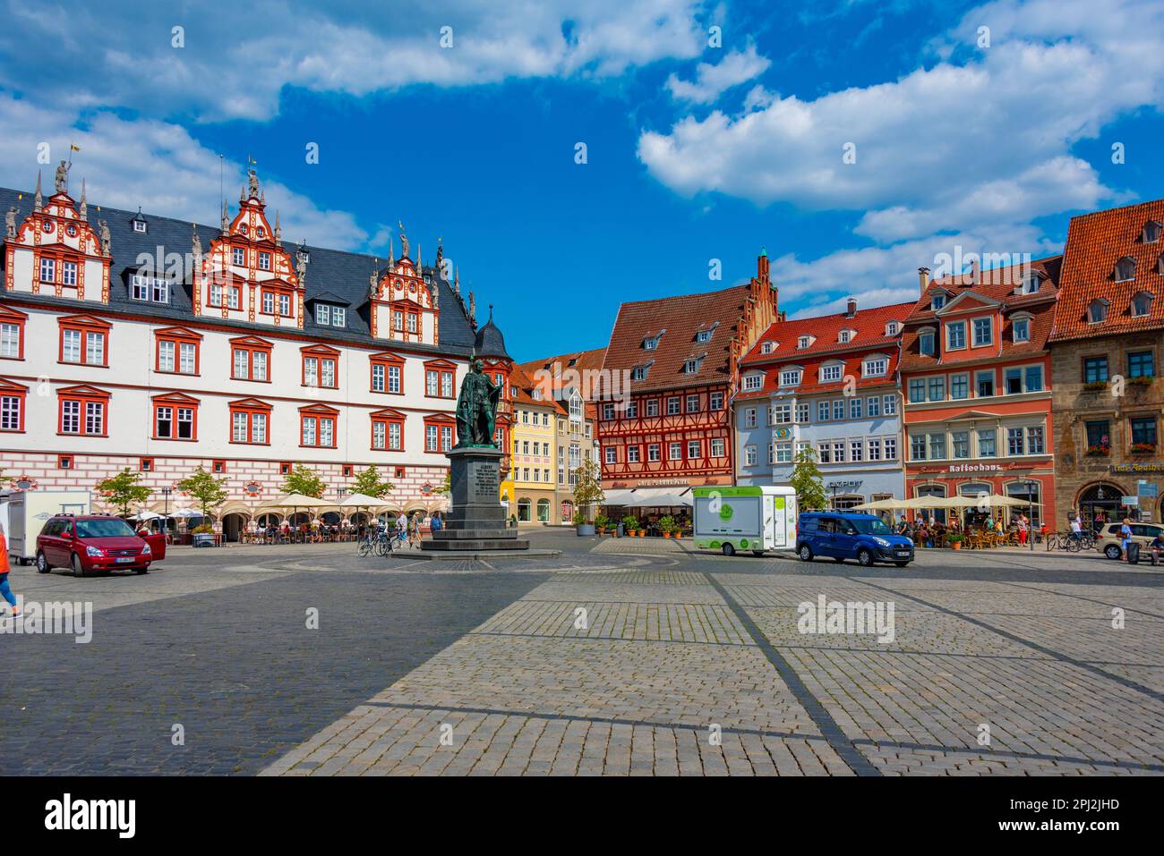 Coburg, Germany, August 10, 2022: Statue of prince Albert and Stadthaus ...