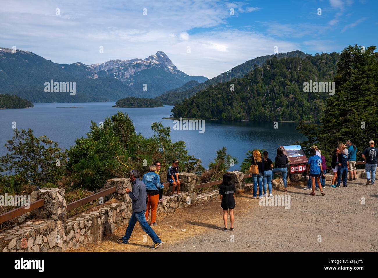 Tourists on the Lookout point at Lake Espejo (Mirror) on Lanin National ...