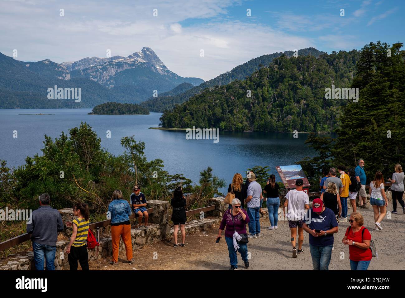 Tourists on the Lookout point at Lake Espejo (Mirror) on Lanin National ...
