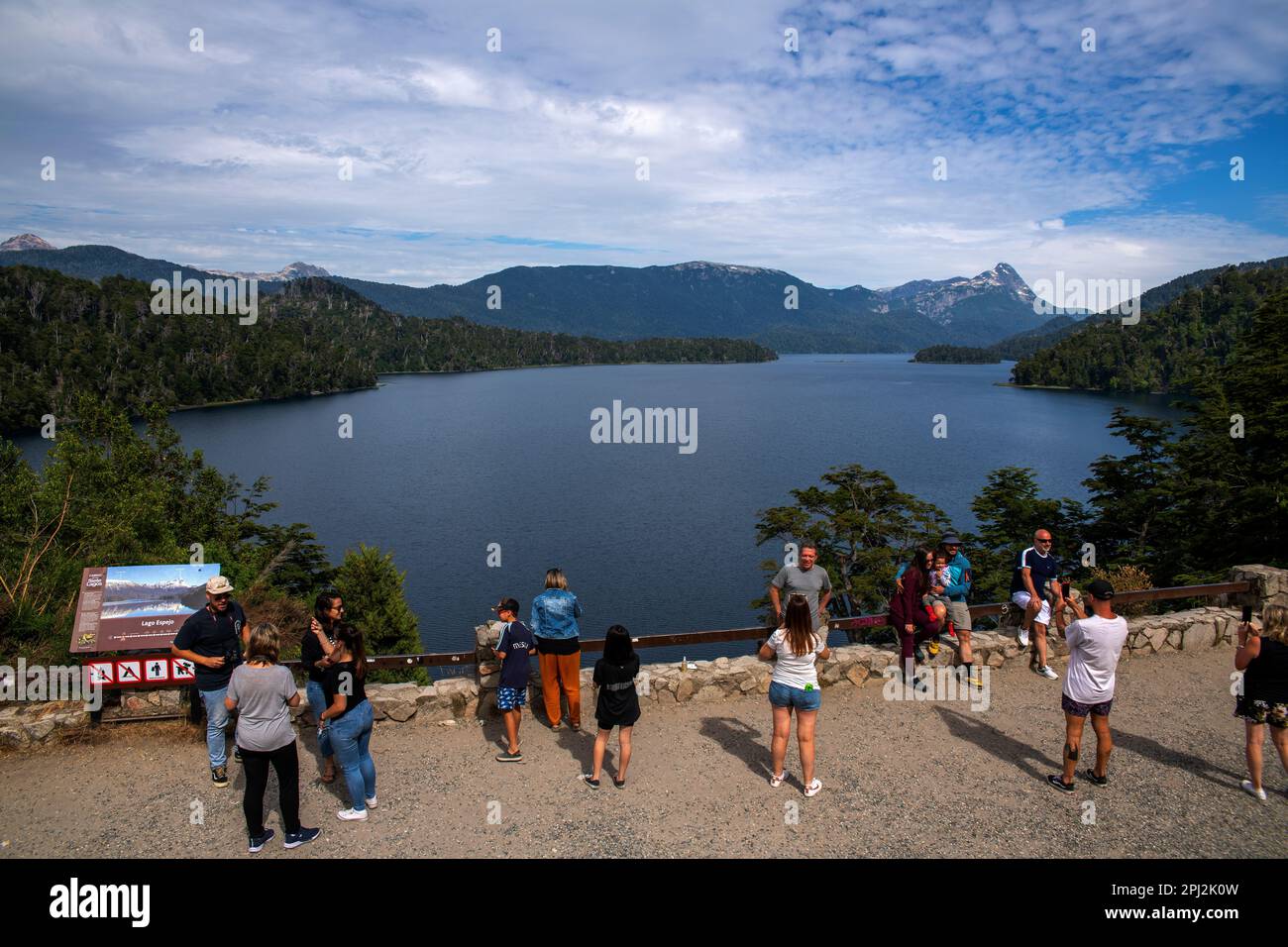 Tourists on the Lookout point at Lake Espejo (Mirror) on Lanin National ...