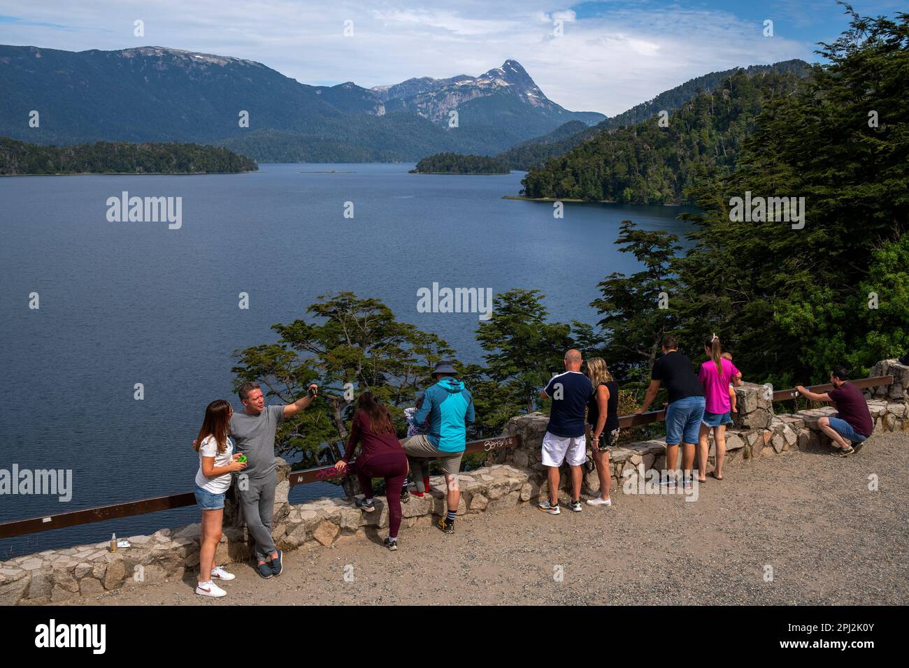 Tourists on the Lookout point at Lake Espejo (Mirror) on Lanin National ...