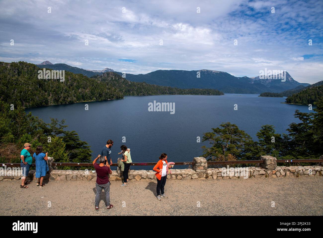 Tourists on the Lookout point at Lake Espejo (Mirror) on Lanin National ...