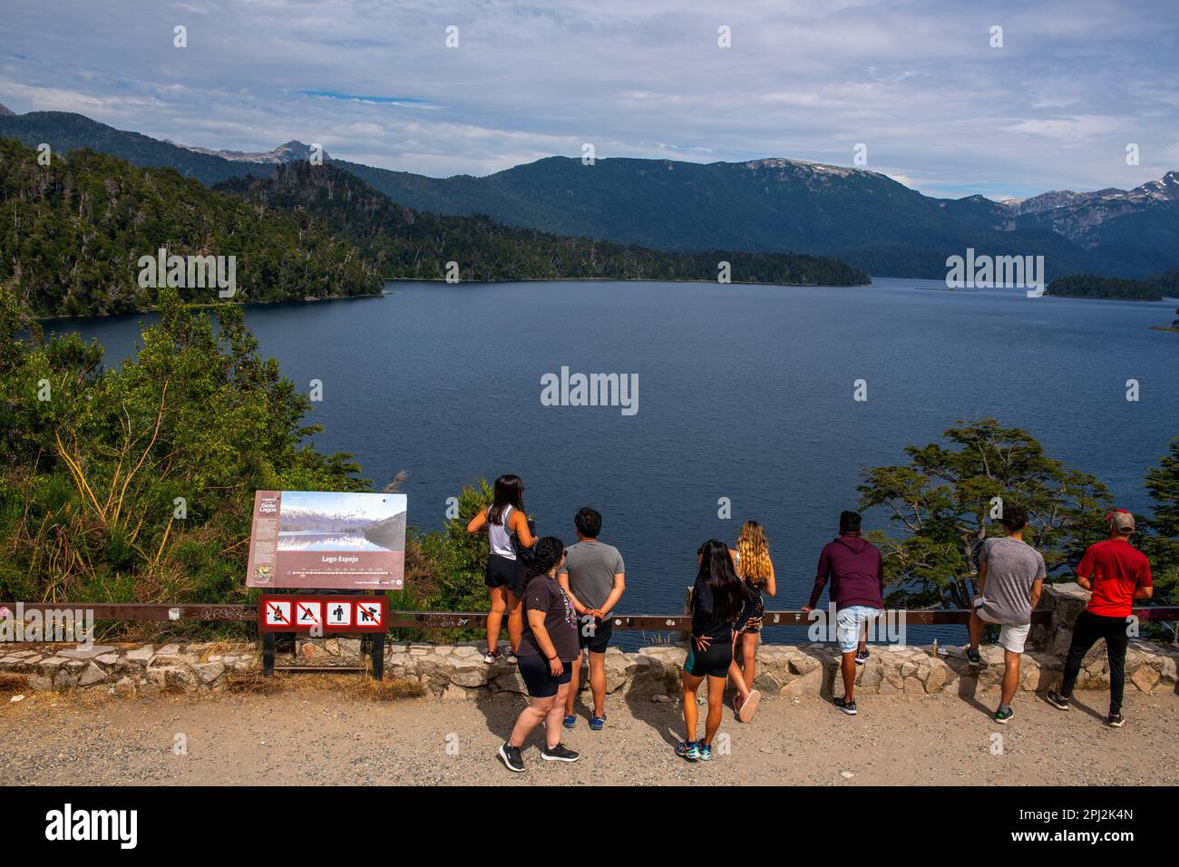 Tourists on the Lookout point at Lake Espejo (Mirror) on Lanin National ...