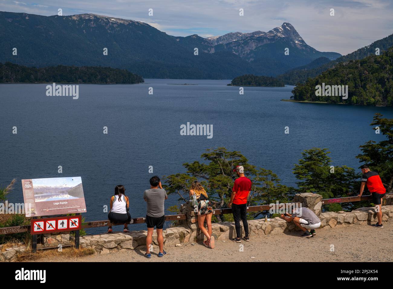 Tourists on the Lookout point at Lake Espejo (Mirror) on Lanin National ...