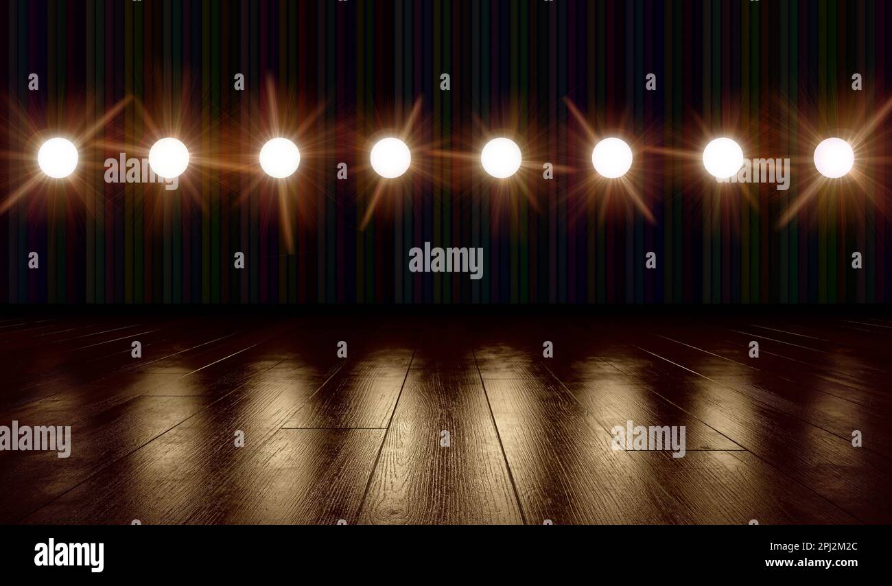 Theatrical spotlights turned on seen from the front on the reflective ...