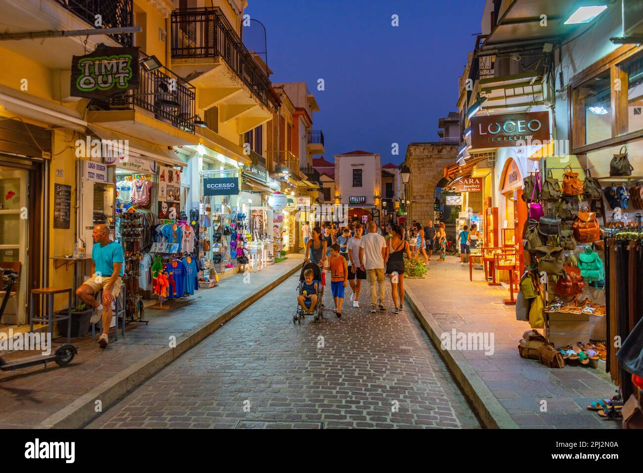 Rethimno, Greece, August 20, 2022: Sunset view of people strolling at a ...