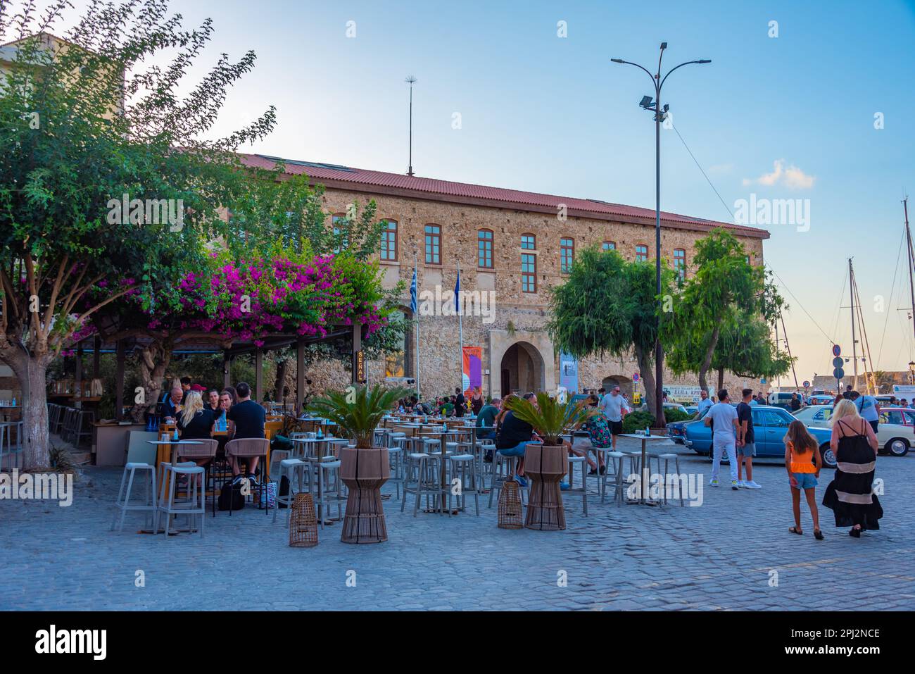 Chania, Greece, August 21, 2022: Sunset view of a tourist street in ...