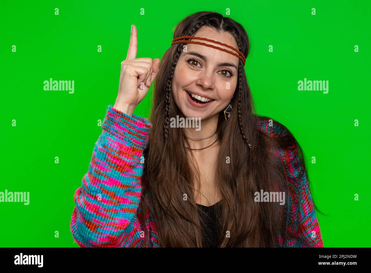 Eureka. Inspired young woman pointing finger up with open mouth, having ...