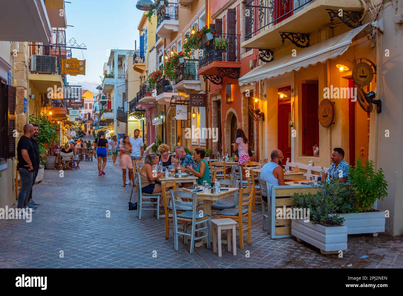 Chania, Greece, August 21, 2022: Sunset view of a tourist street in ...
