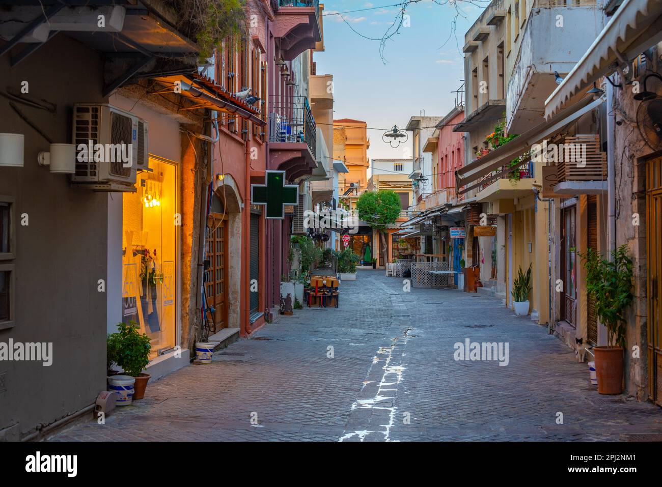 Chania, Greece, August 23, 2022: Sunrise view of a tourist street in ...