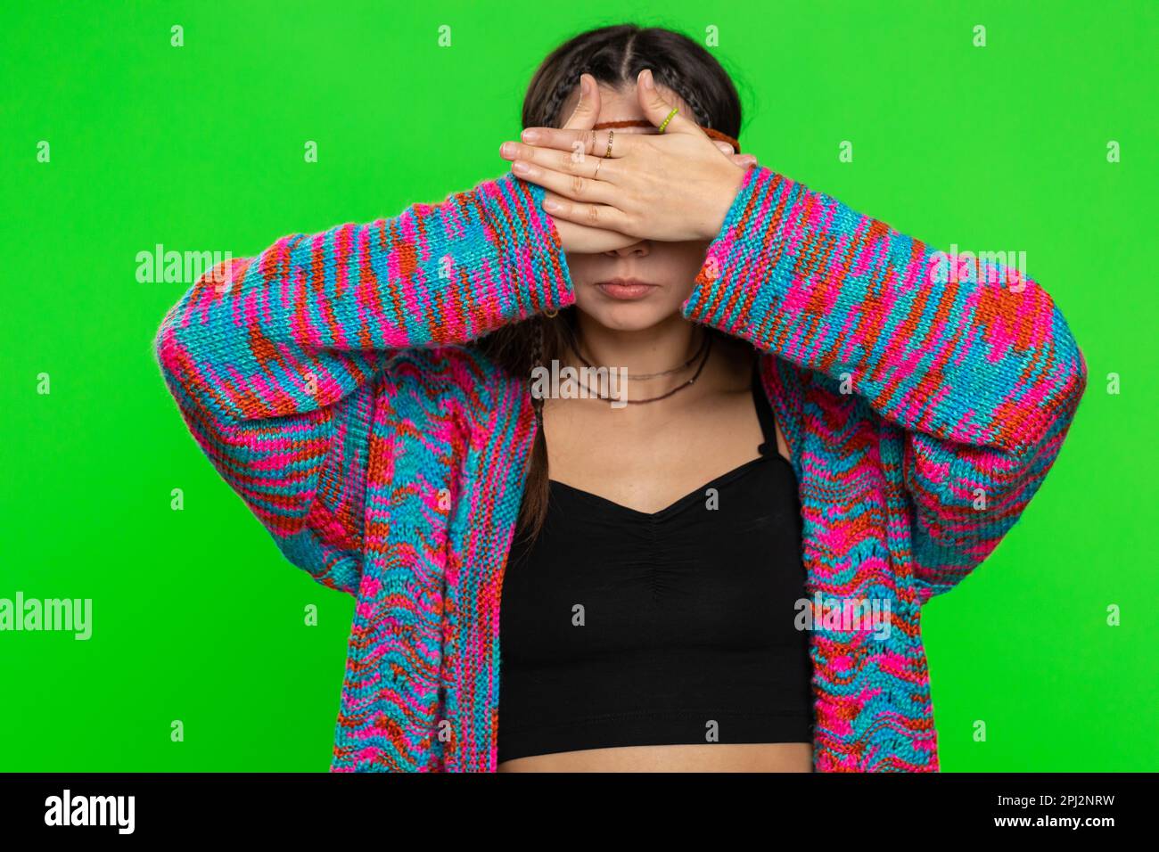 Dont want to look at this, awful. Afraid woman closing eyes with hand ...