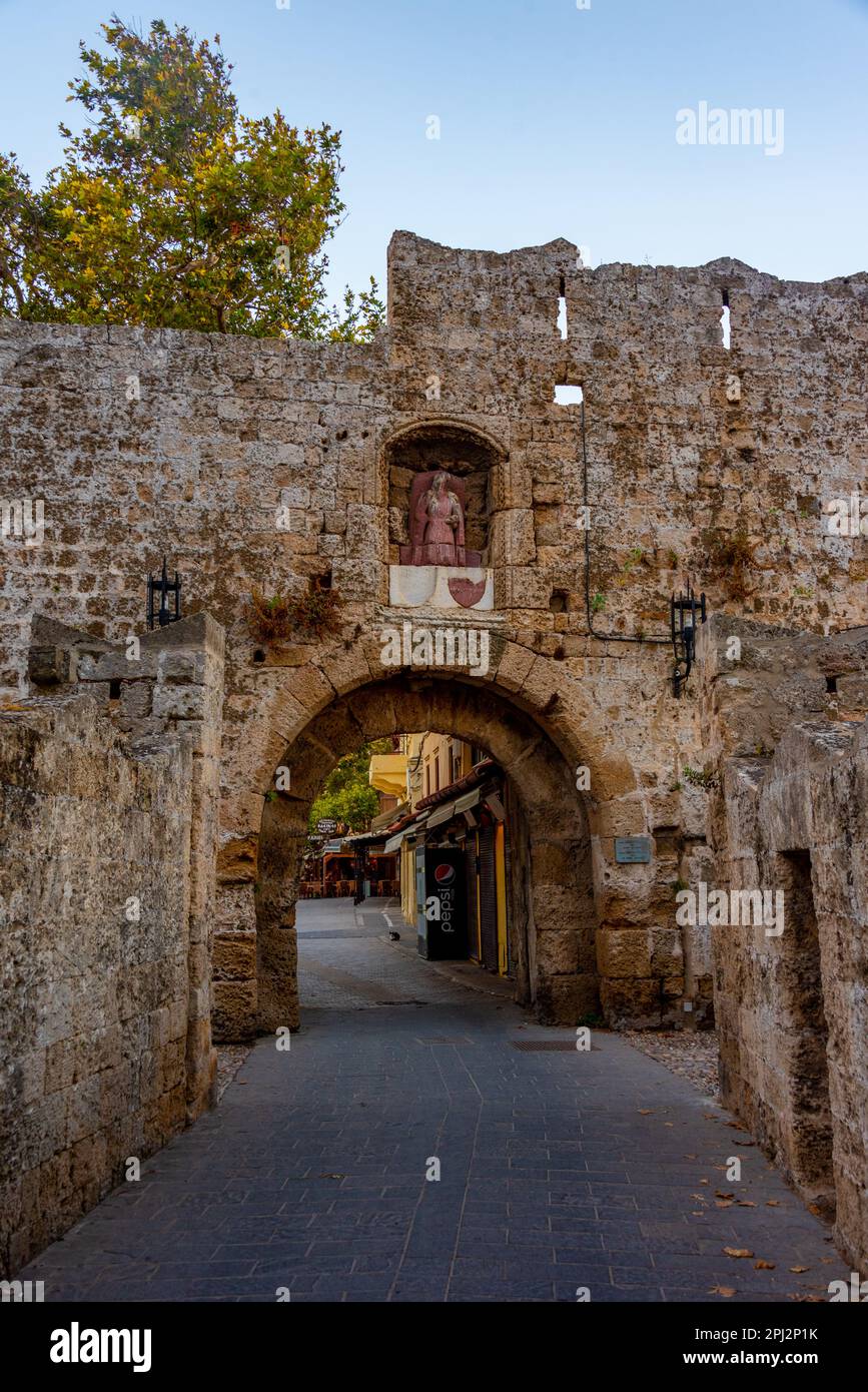 Rhodes, Greece, August 25, 2022: Sunrise view of the Saint Anthony gate ...