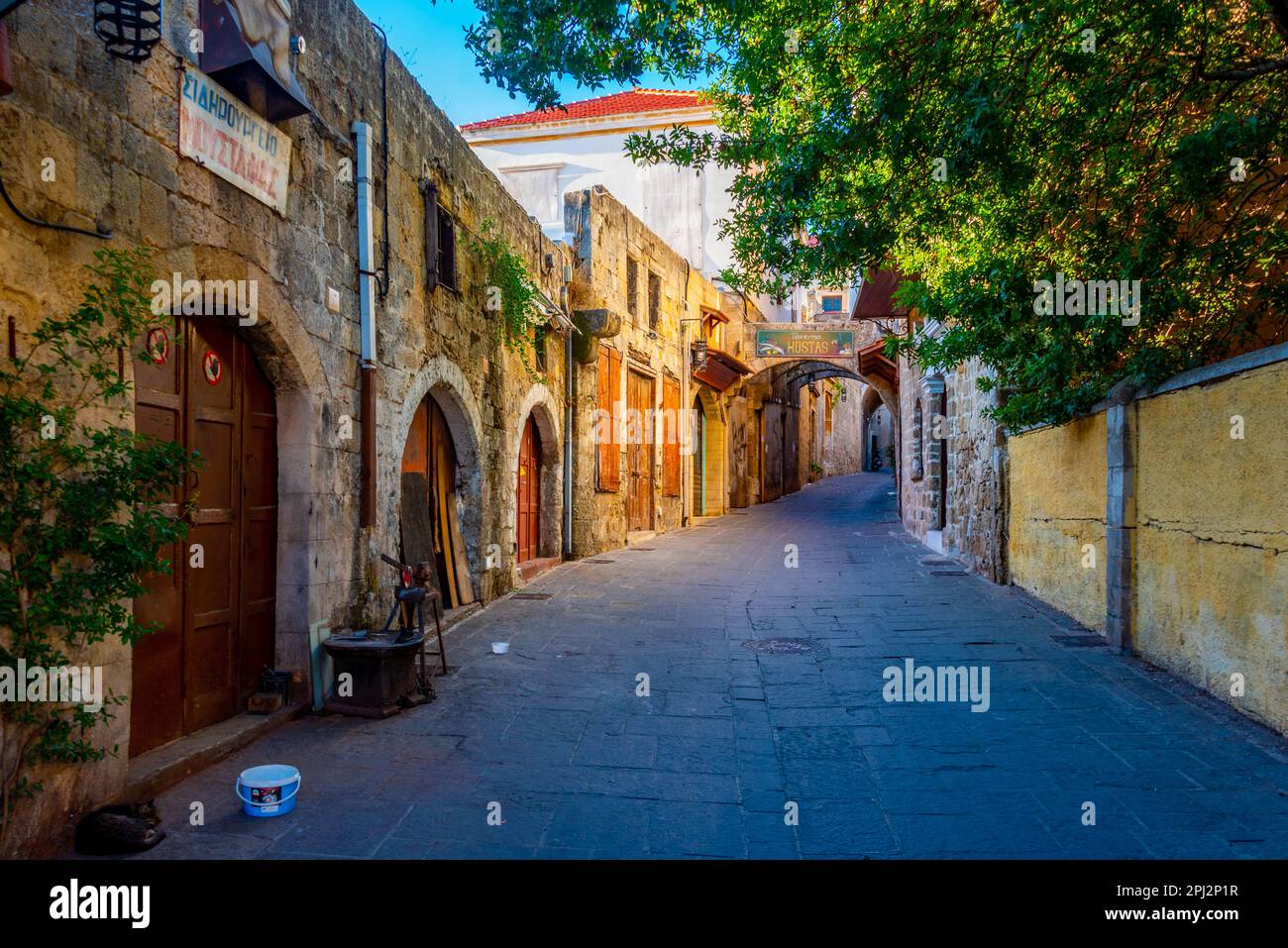 Rhodes, Greece, August 25, 2022: View of a tourist street in Greek port ...