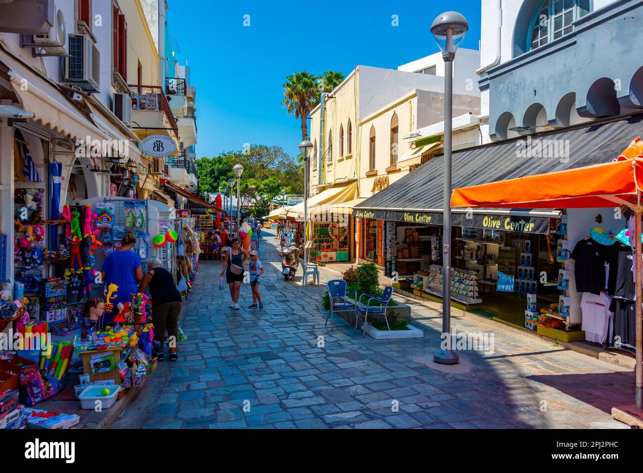 Kos, Greece, August 28, 2022: View of a tourist street in Greek town ...