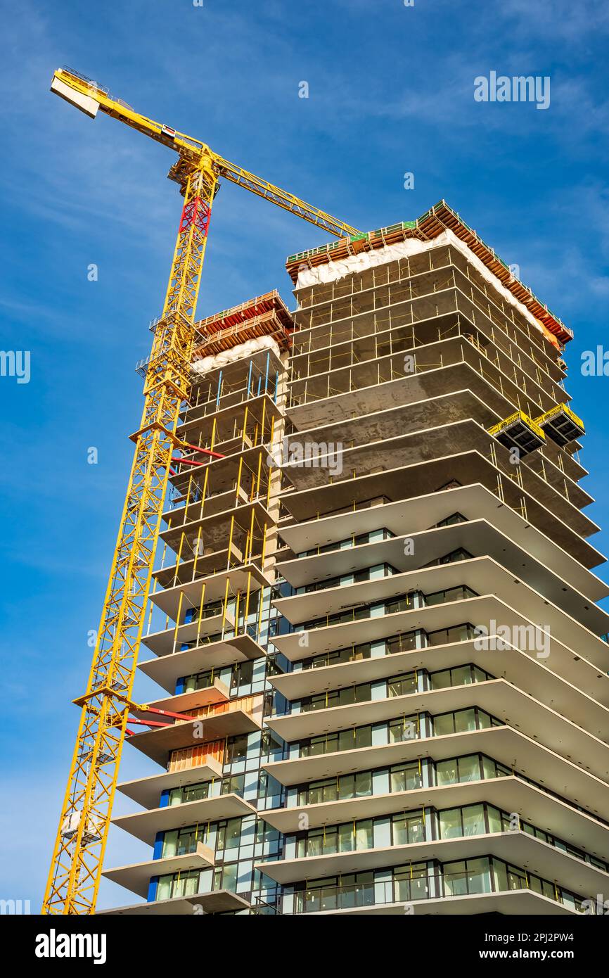 Building site with cranes new development in the city. Concrete high ...