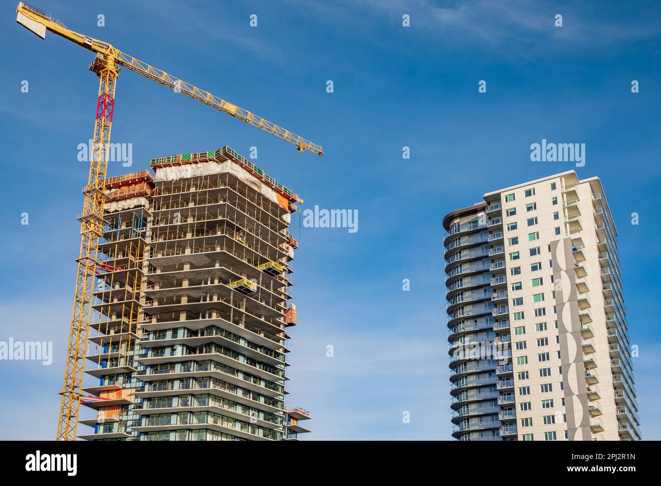 Building site with cranes new development in the city. Concrete high ...