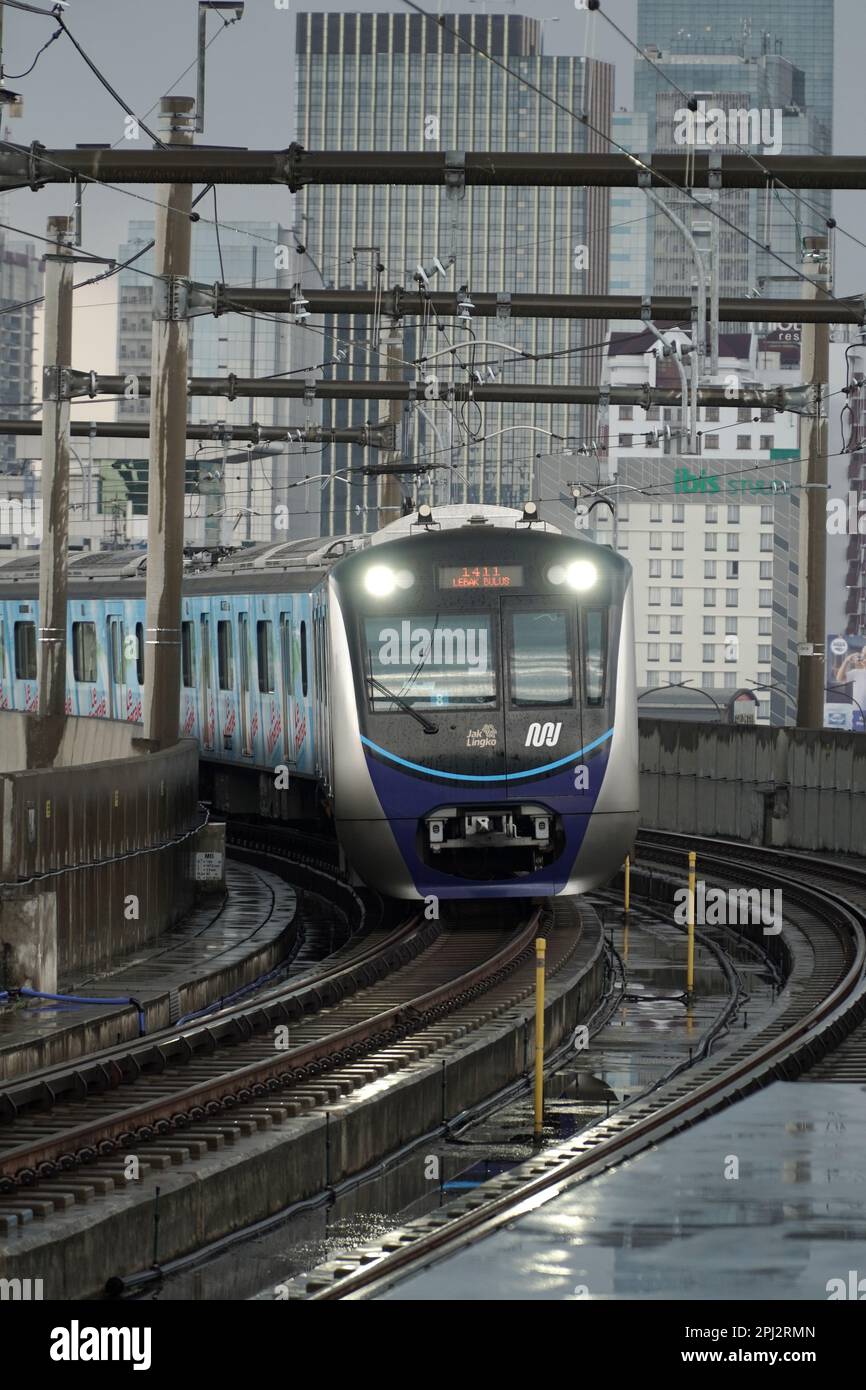 Mass Rapid Transit (MRT) train in passing Fatmawati Station with ...