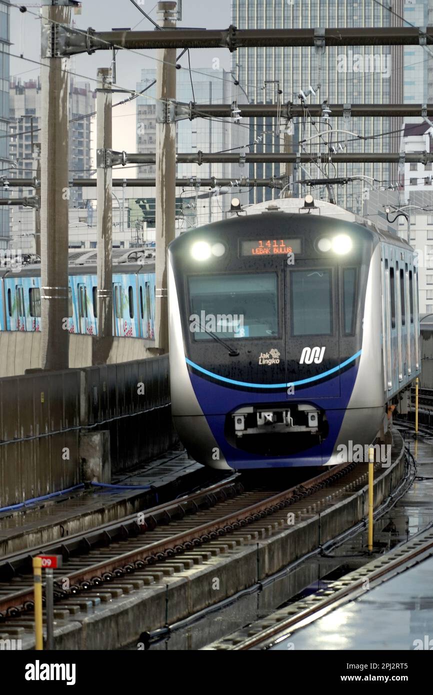 Mass Rapid Transit (MRT) train in passing Fatmawati Station with ...