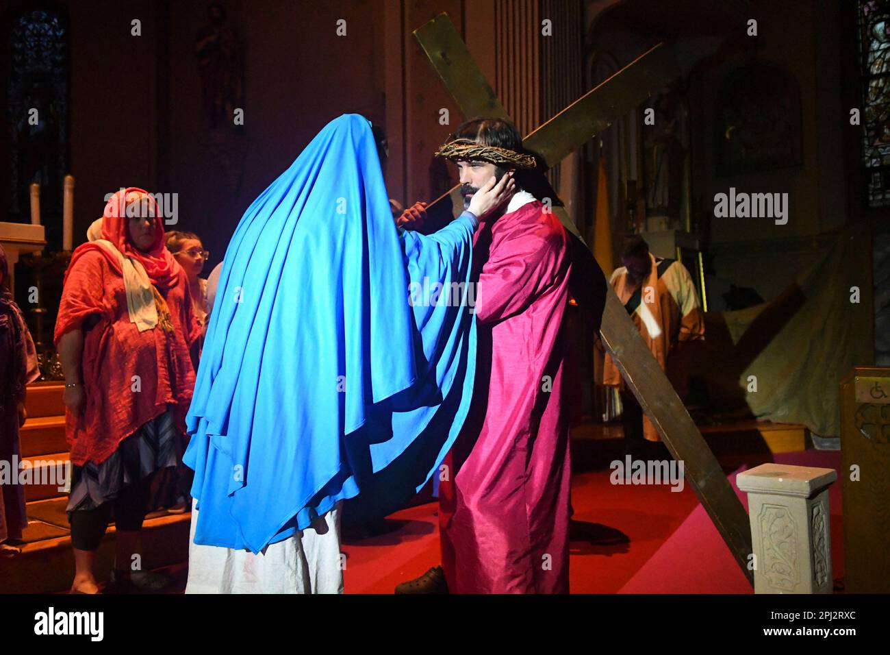 Jesus portrayed by Vince Balulis meets his mother Mary portrayed by ...