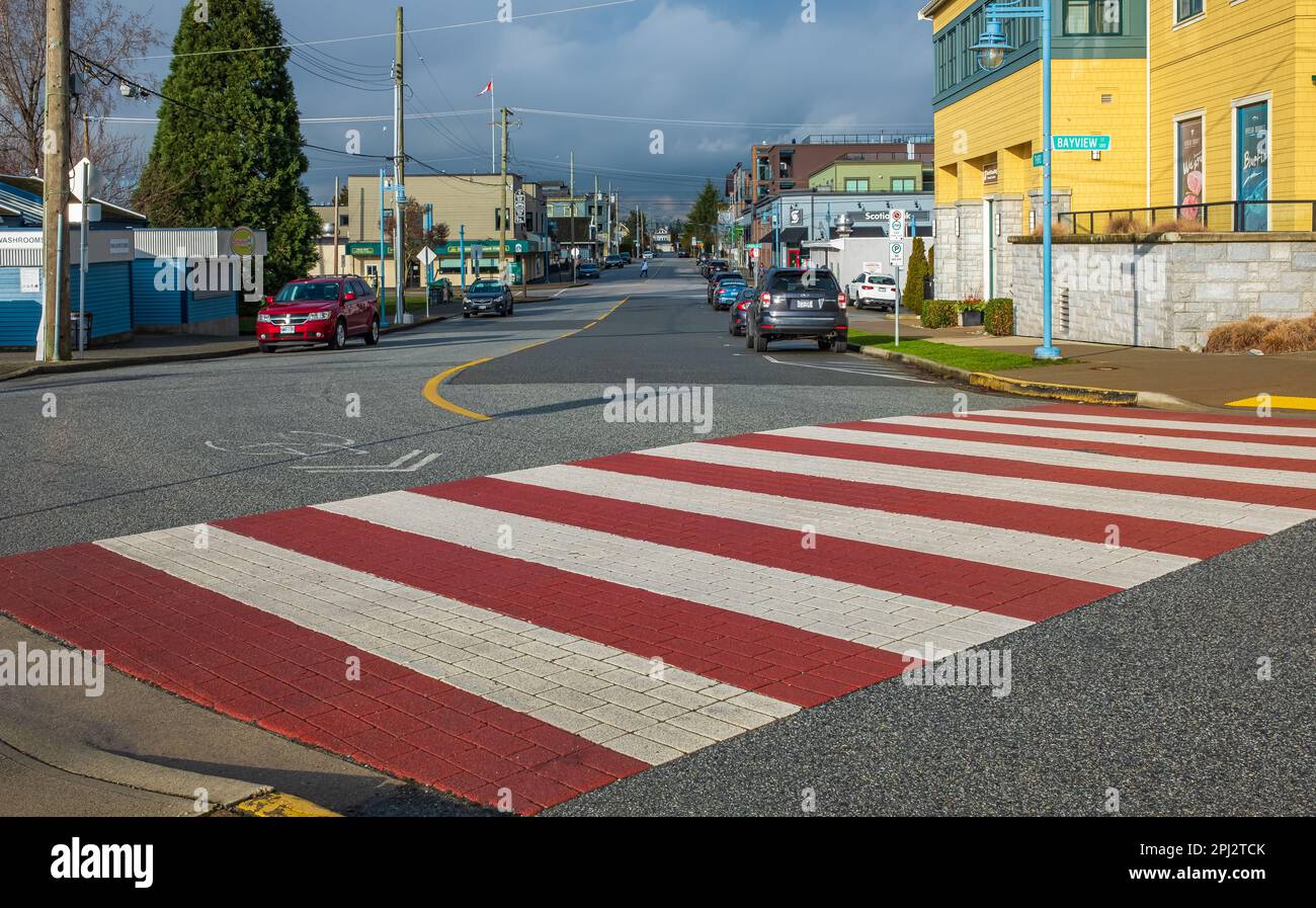 pedestrian crossing, white and red stripes on black asphalt, road ...