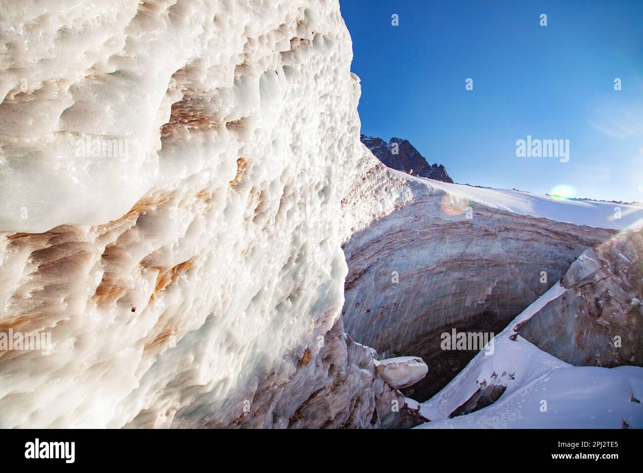 Beautiful ice cave in glacier. Winter mountain landscape Stock Photo ...