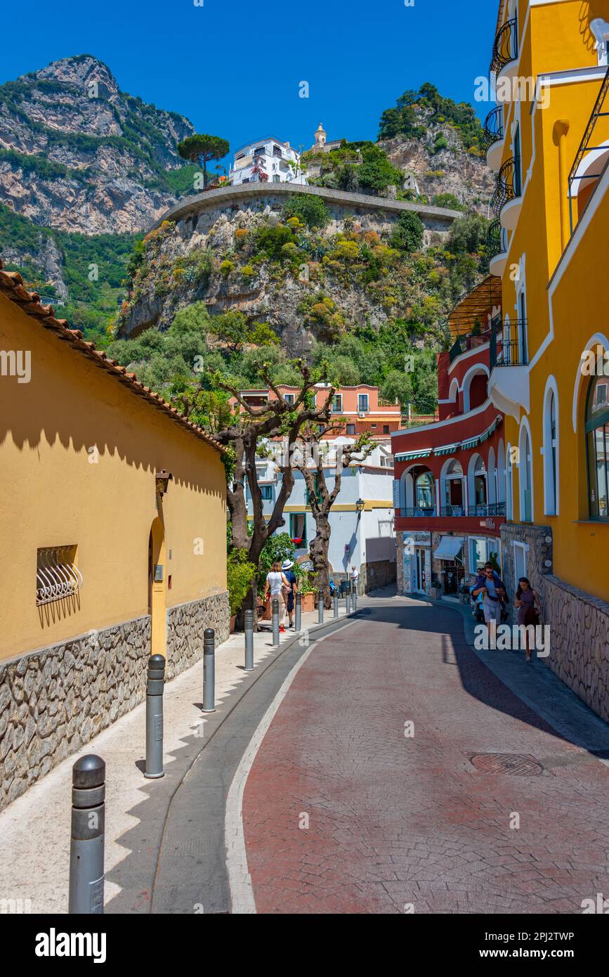 Positano, Italy, May 21, 2022: People are strolling through the old ...