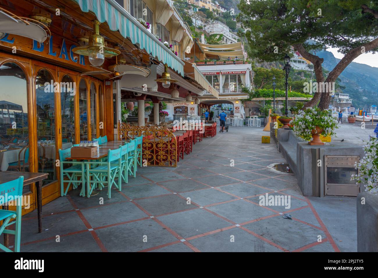 Positano, Italy, May 21, 2022: People are strolling through the old ...