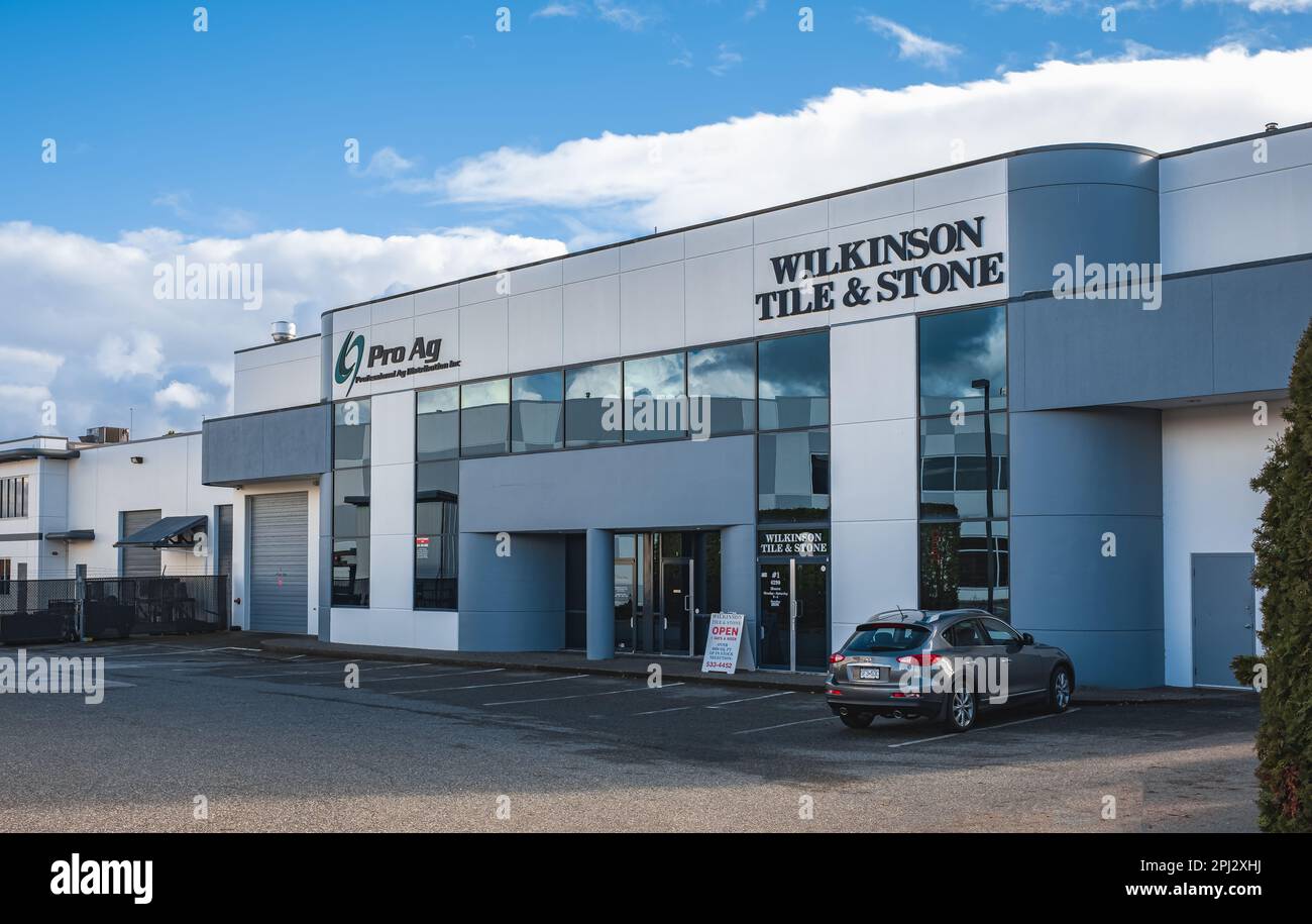 Commerce Industry new modern building with logos of different companies ...