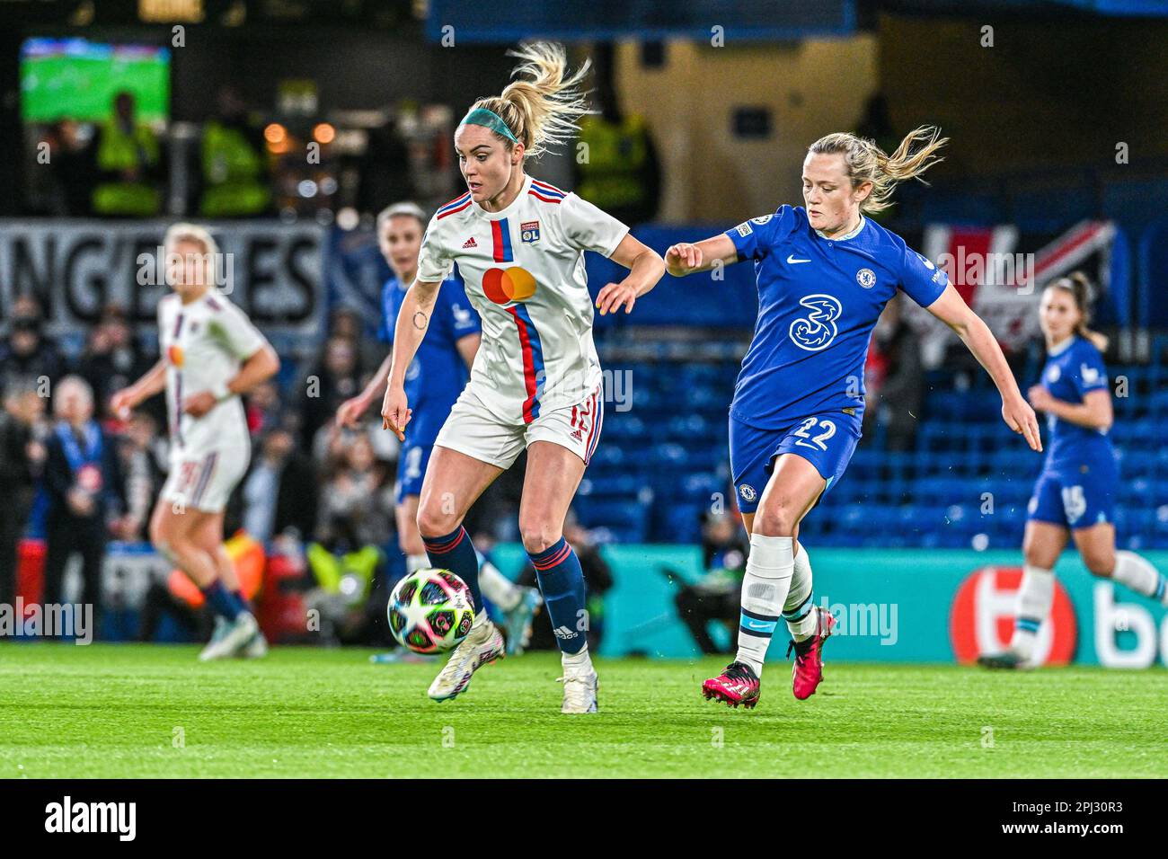 Ellie Carpenter (12) of Lyon and Erin Cuthbert (22) of Chelsea pictured ...