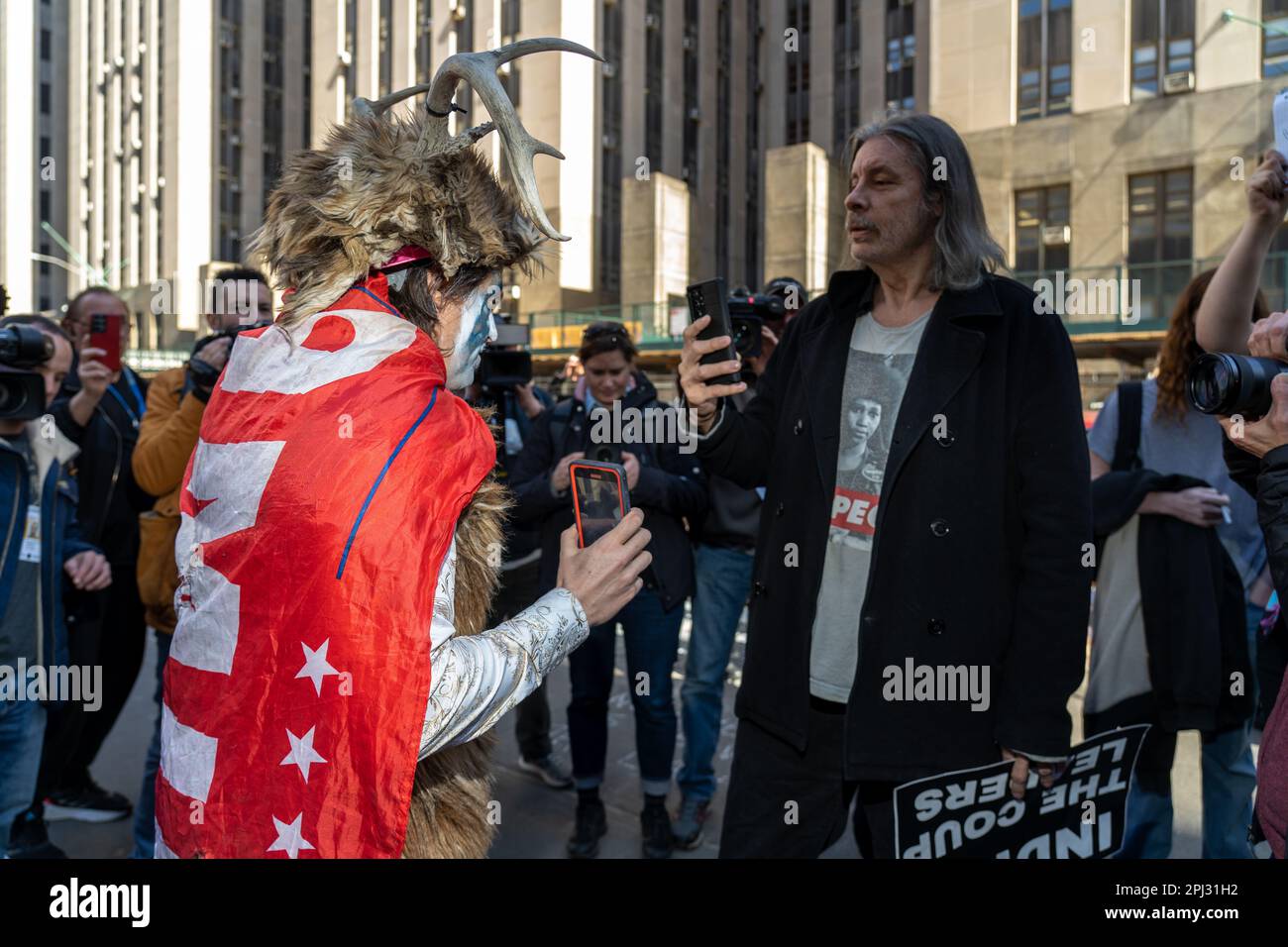 Protesters gather outside the Manhattan Criminal Court over the news of ...