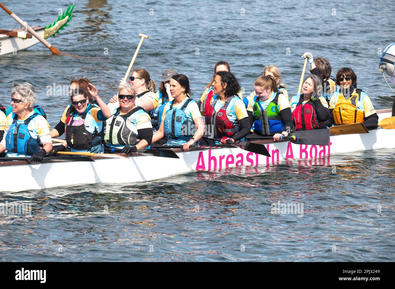 Dragon Boat Race - competitors looking relaxed after the finish of a ...