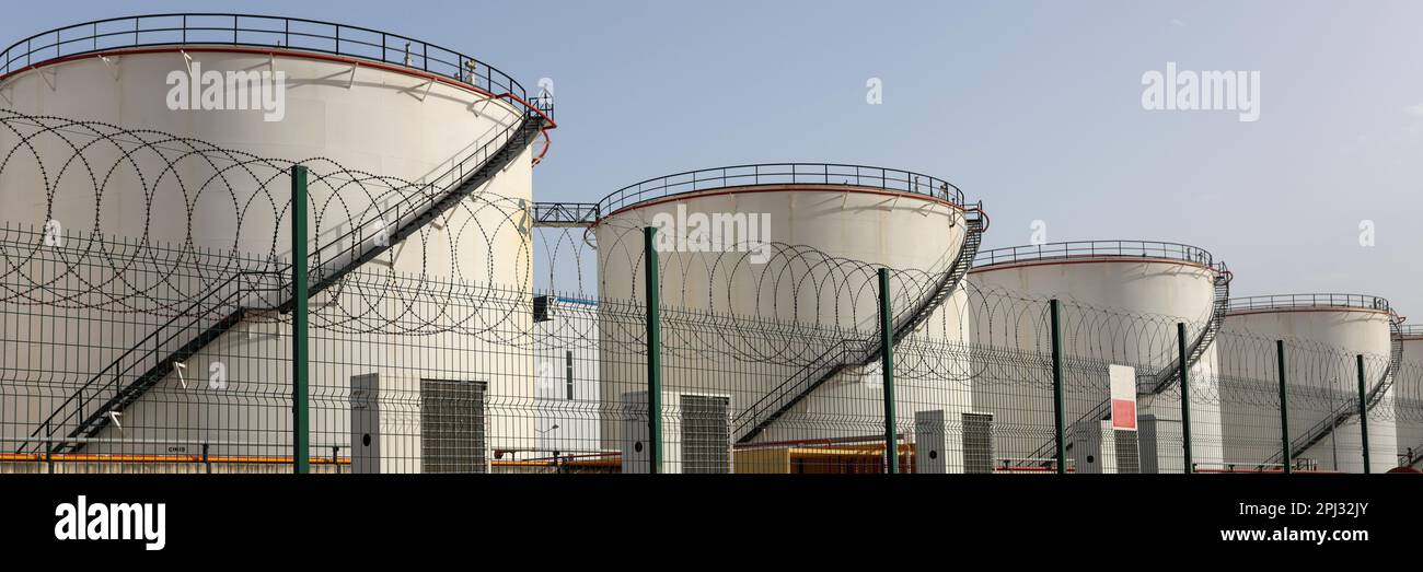 Oil and gas storage terminal with tanker silo Stock Photo - Alamy
