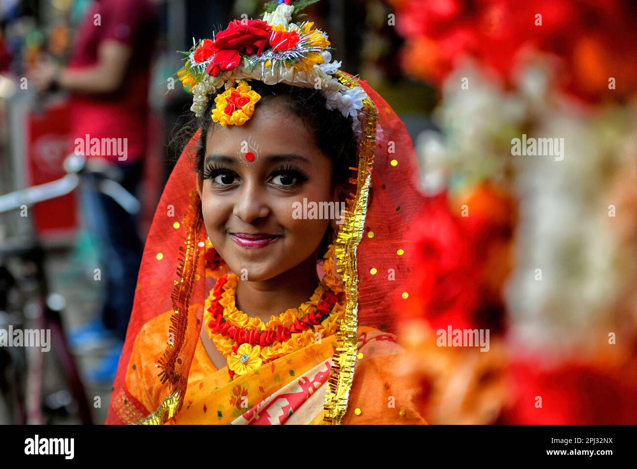 A young girl dressed up for the Kumari Puja ritual at the adyapith ...
