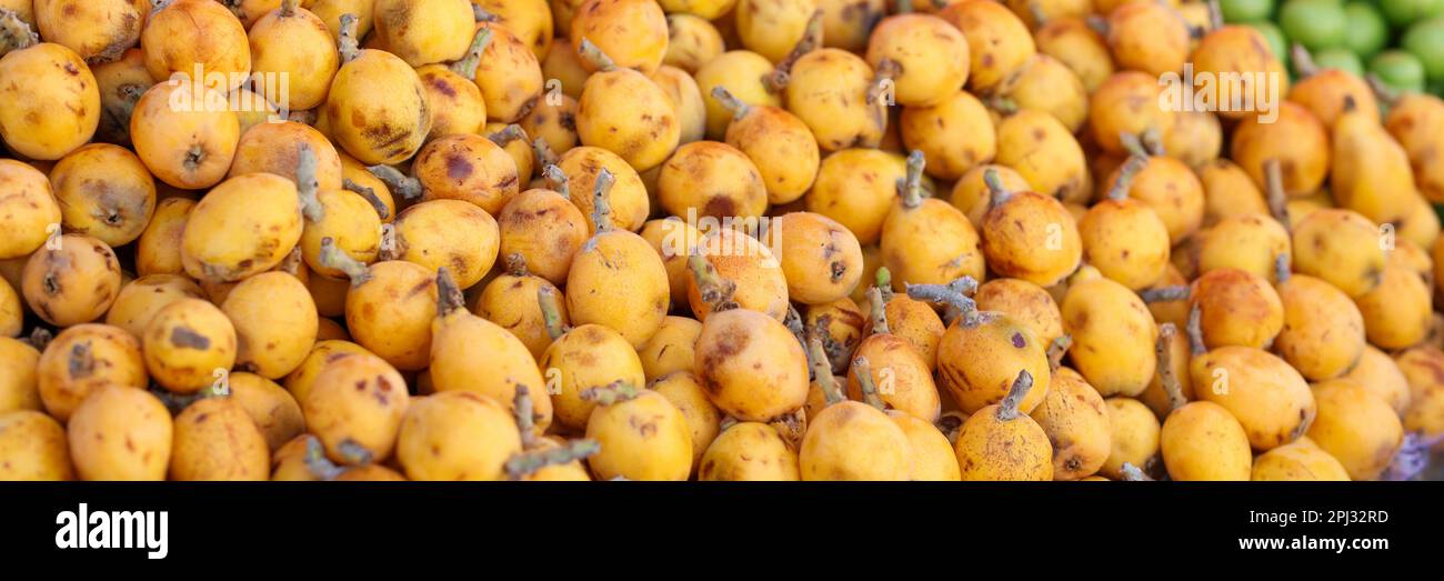 Fruits and vegetables in market closeup. Mature appetizing pears on ...