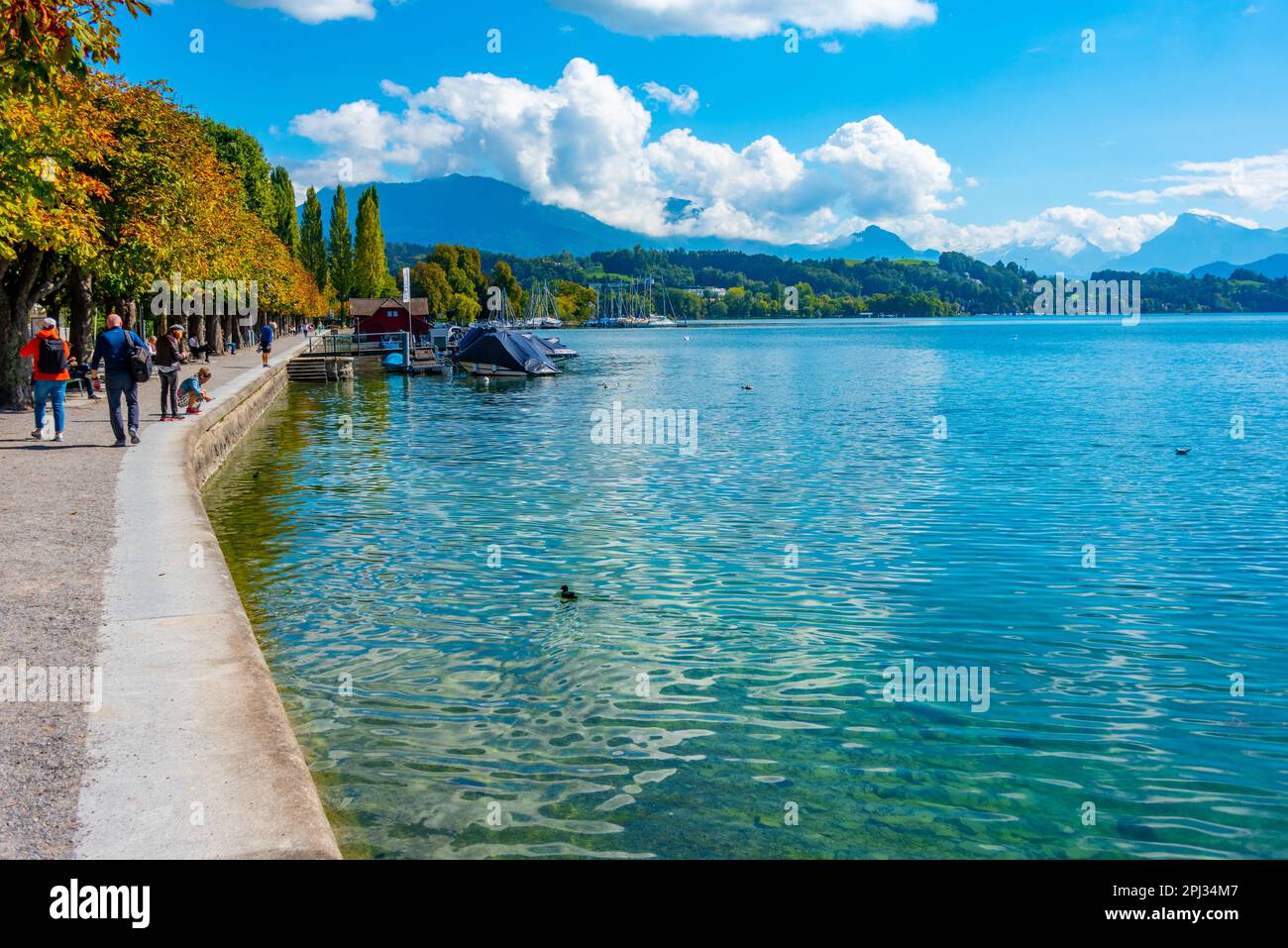 Luzern, Switzerland, September 20, 2022: Alley at waterfront of lake ...