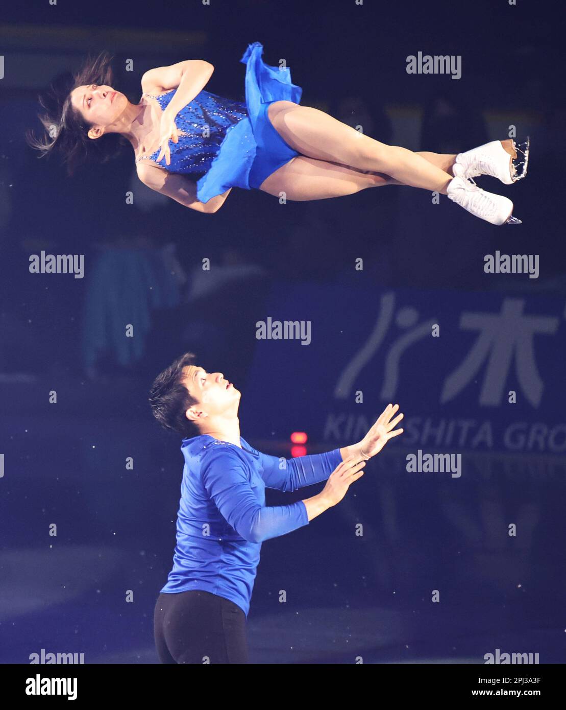 Japanese figure skaters Riku Miura and Ryuichi Kihara perform during an ...