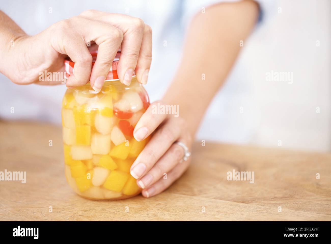 Hand opening jar hi-res stock photography and images - Alamy