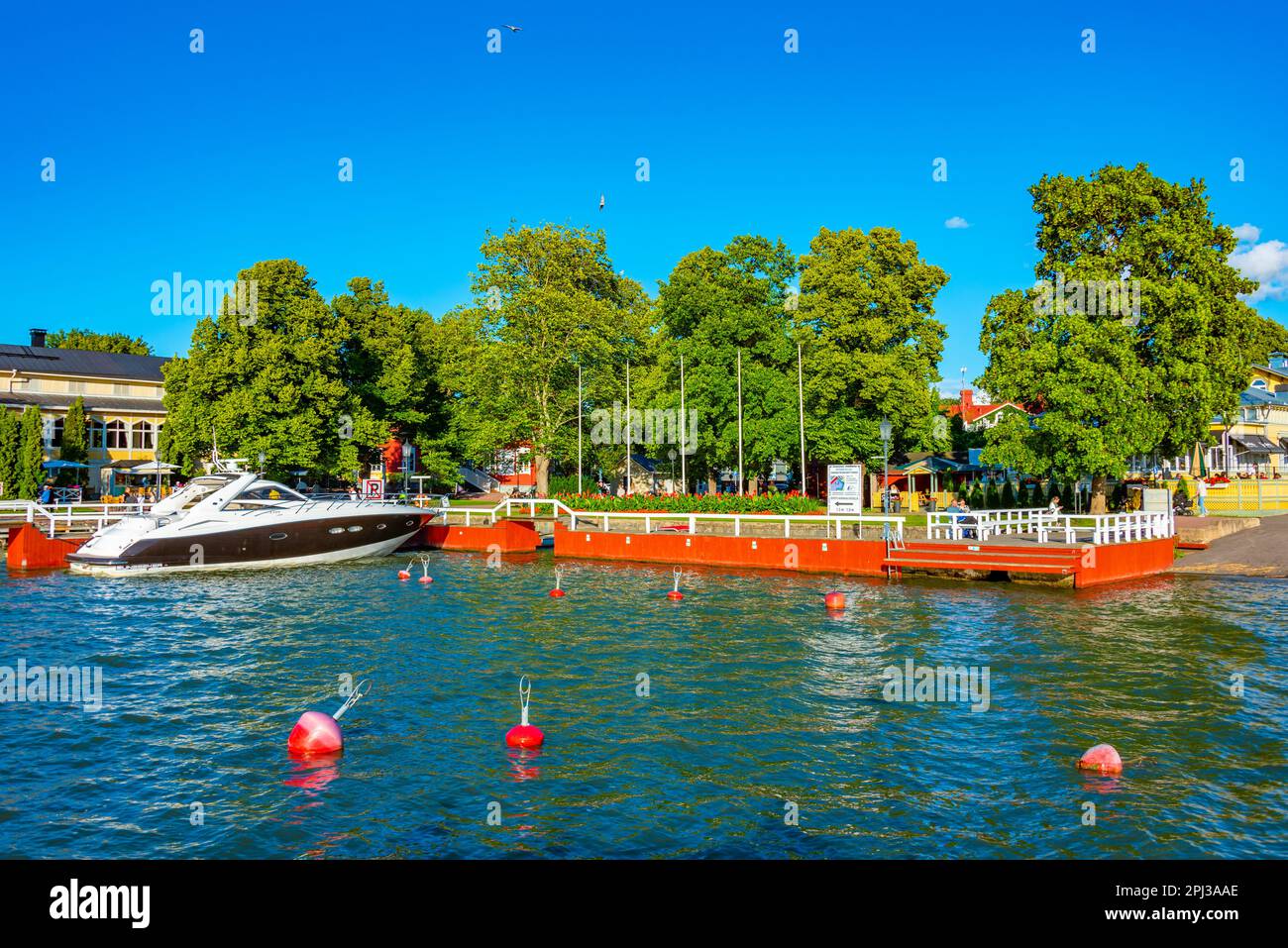 Naantali, Finland, July 29, 2022: Naantali church viewed over marina in ...