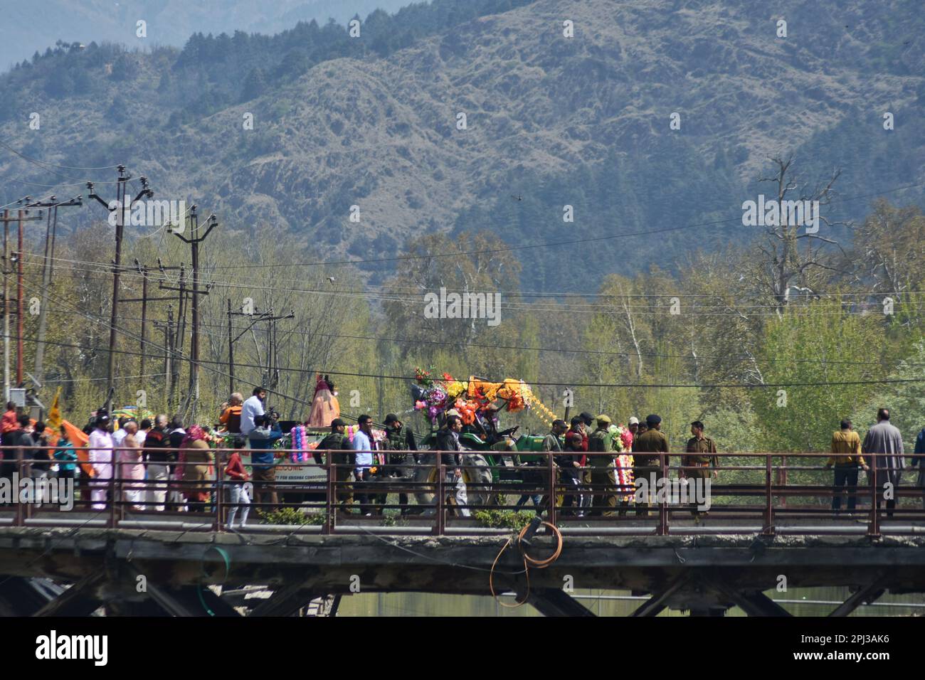 Srinagar, India. 30th Mar, 2023. Kashmiri Hindus celebrate during a procession on Ram Navami ...