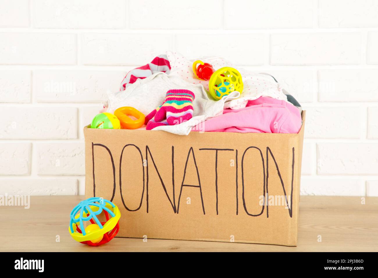 Kid donation box hi-res stock photography and images - Alamy